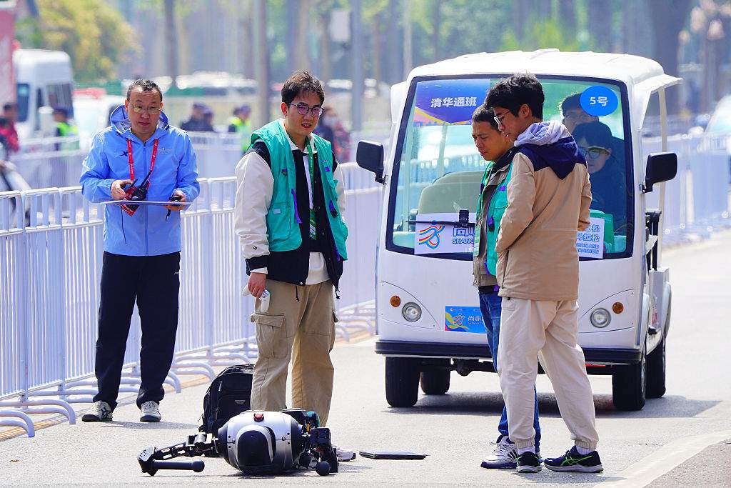 Robot runners’ wobbly debut in Beijing: half-marathon shows tech still ...