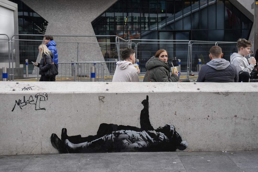 UK’s street artist Banksy unveils latest mural in London | News24