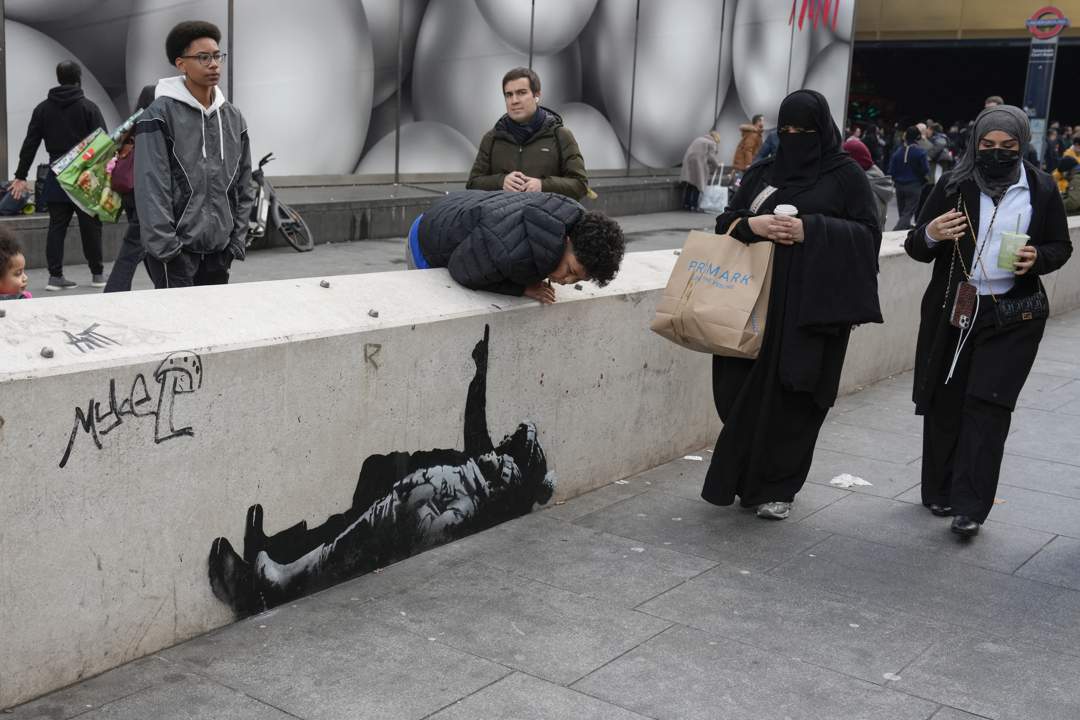 UK’s street artist Banksy unveils latest mural in London | News24